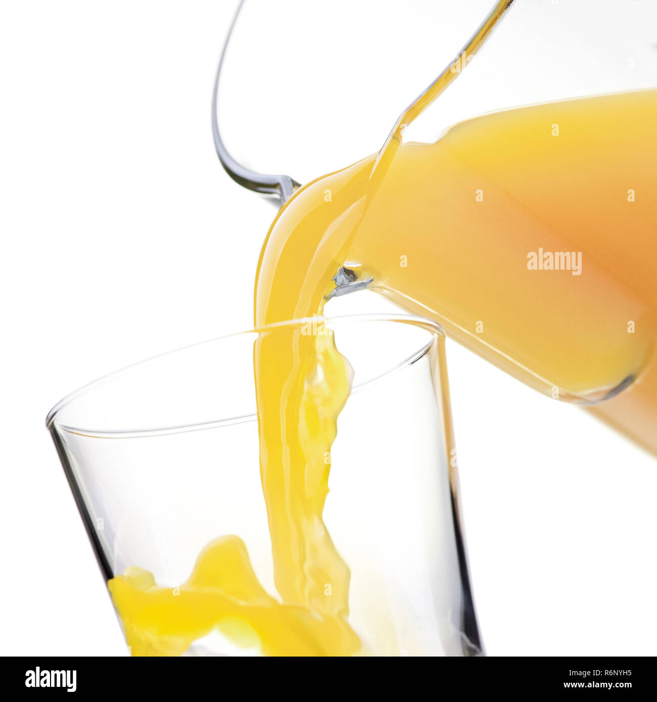 Glass jug filling orange juice hi-res stock photography and images - Alamy