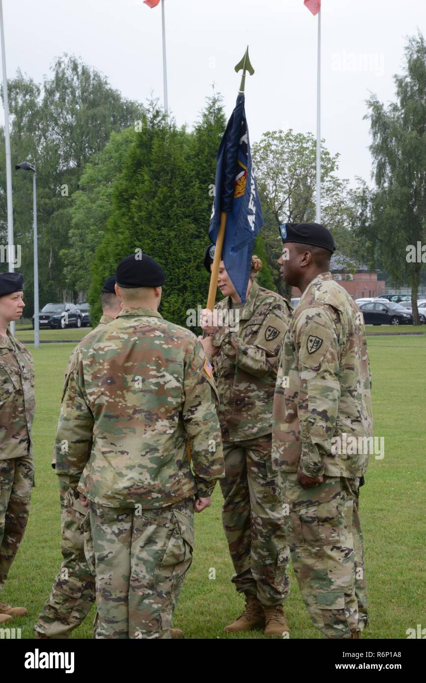 U.S. Army Cpt. Danielle K. Cork (outgoing Commander), receives the ...