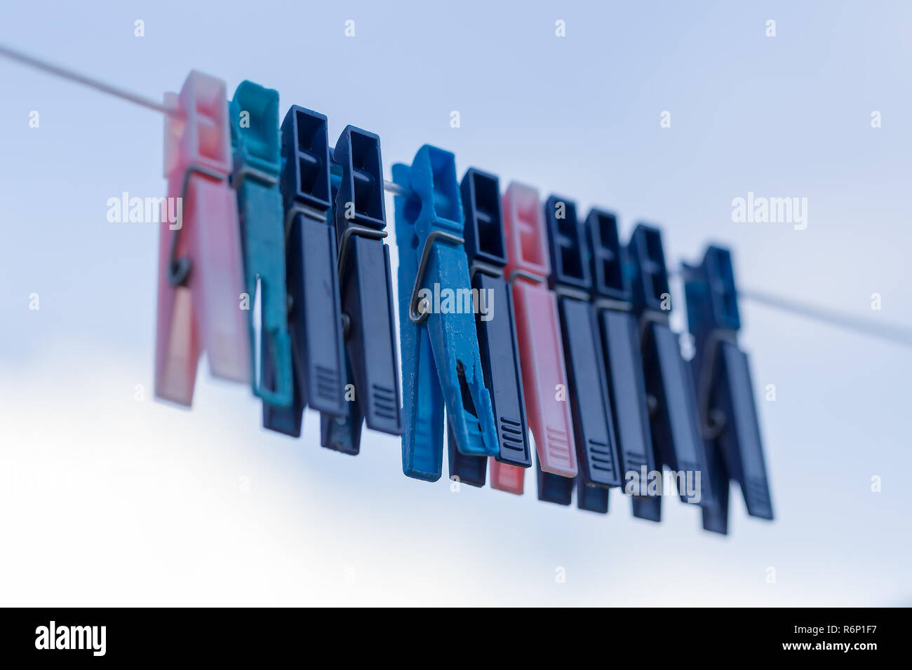 Cloth pegs under the blue sky hi-res stock photography and images - Alamy