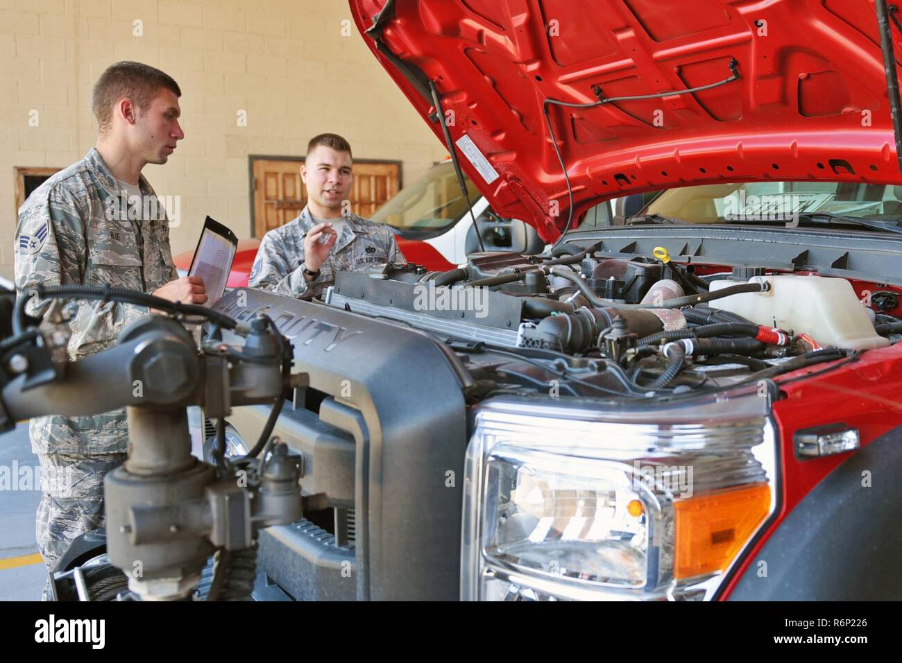 U.S. Air Force Staff Sergeant Zachary White (right), 612th Air Base ...