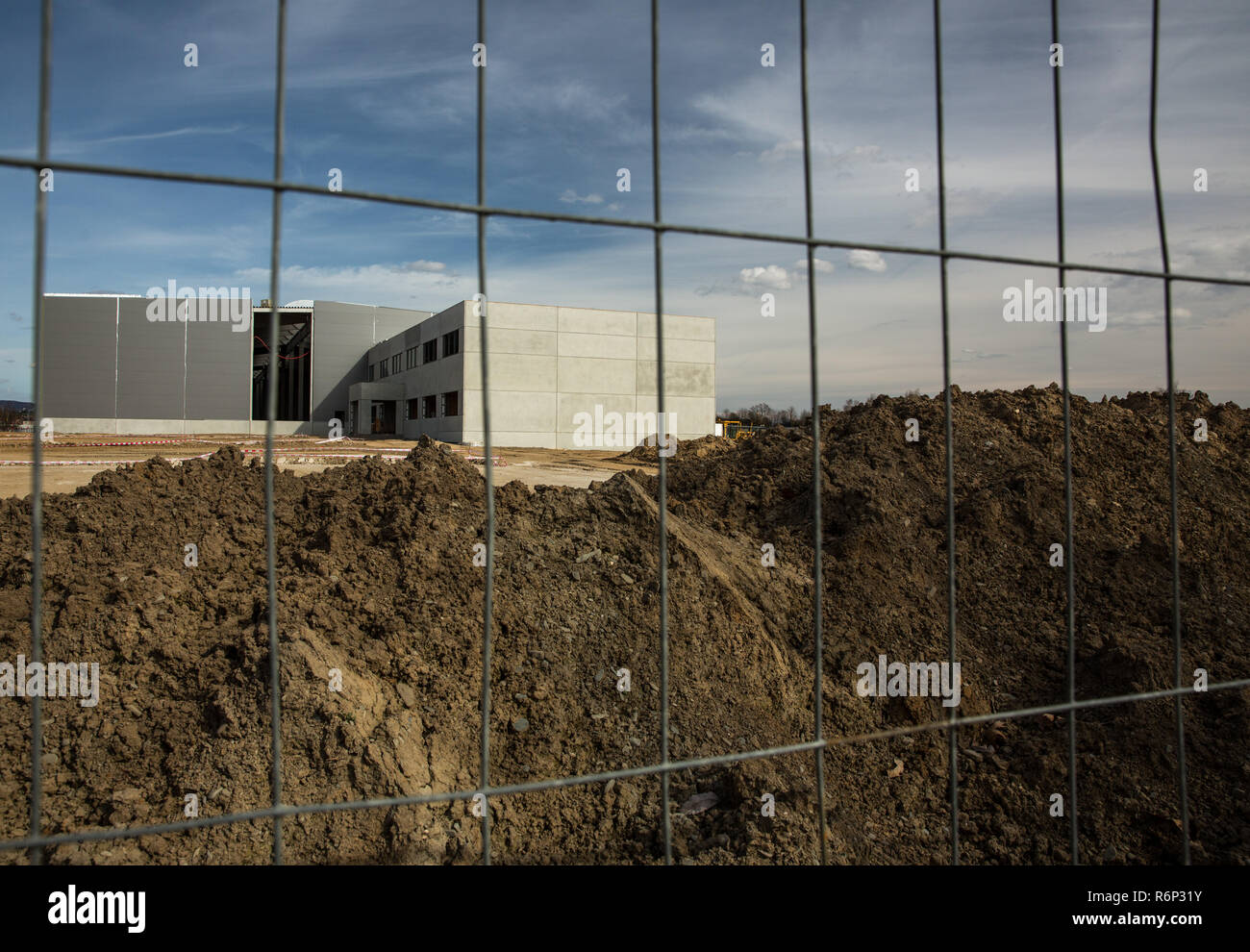Construction site with a fence around it Stock Photo - Alamy
