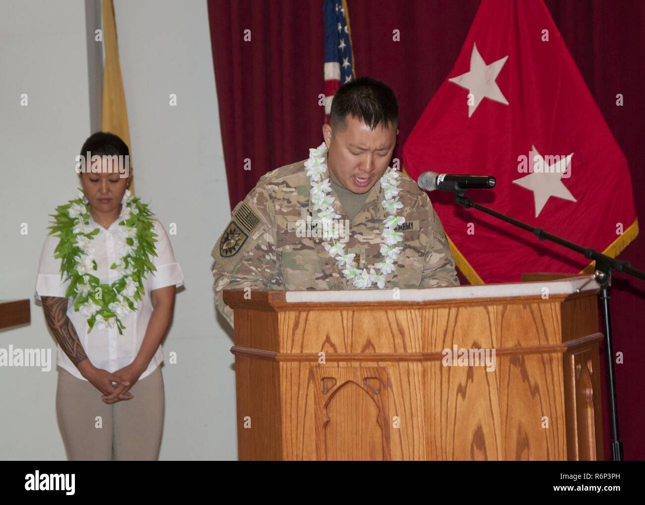Chaplain (Maj.) James Kim, 369th Sustainment Brigade, delivers the ...