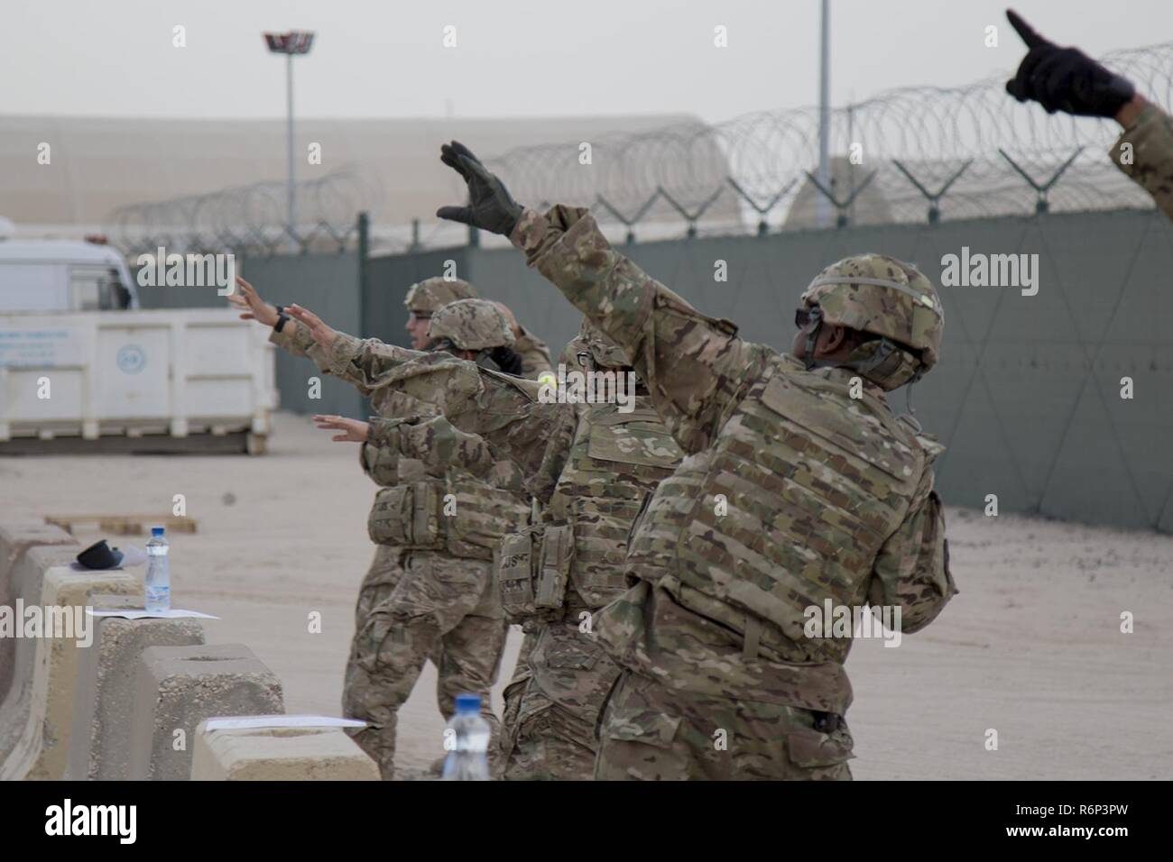Soldiers of the 369th Sustainment Brigade practice hand grenade ...