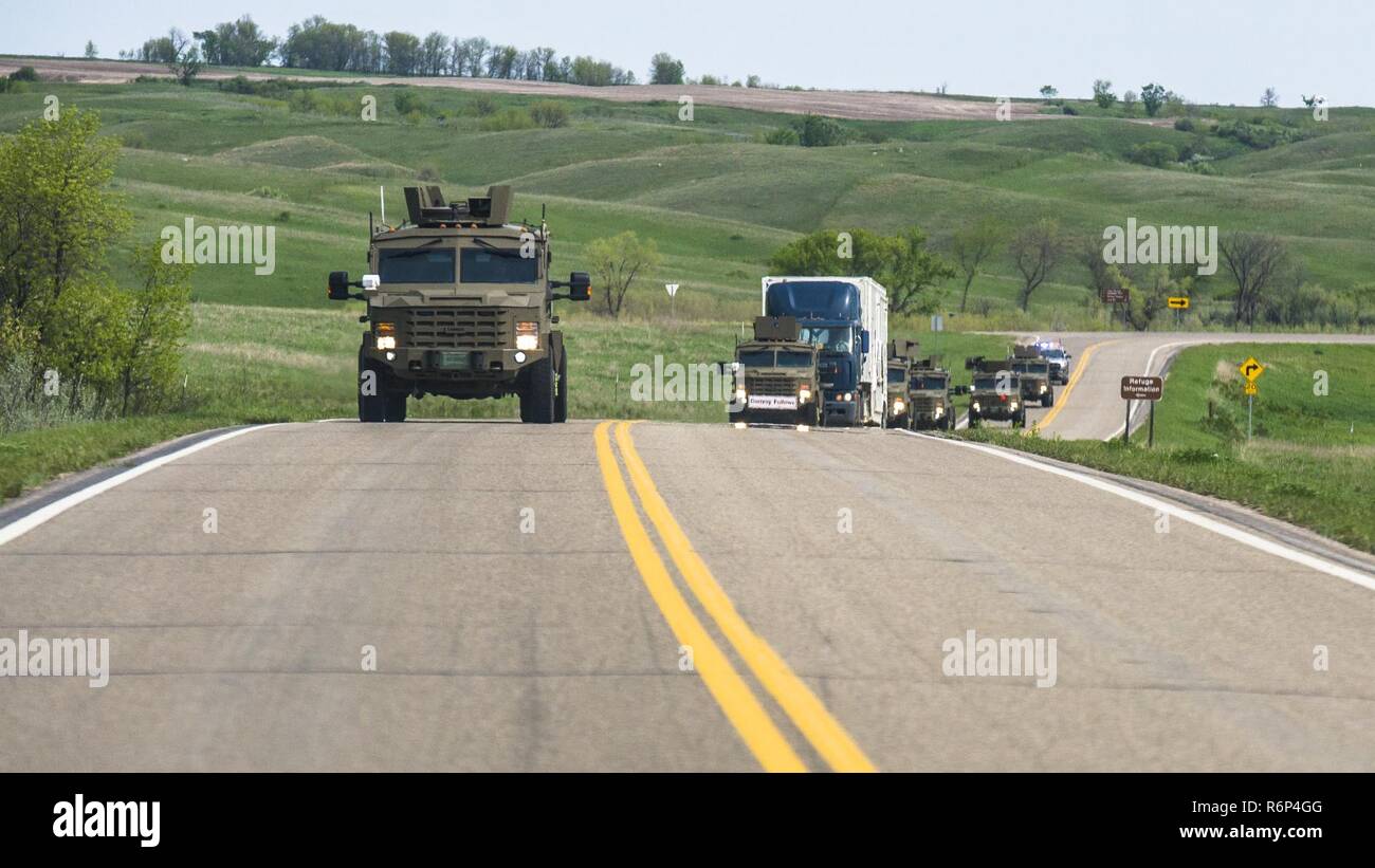 Airmen from the 91st Missile Wing support a convoy movement through the ...