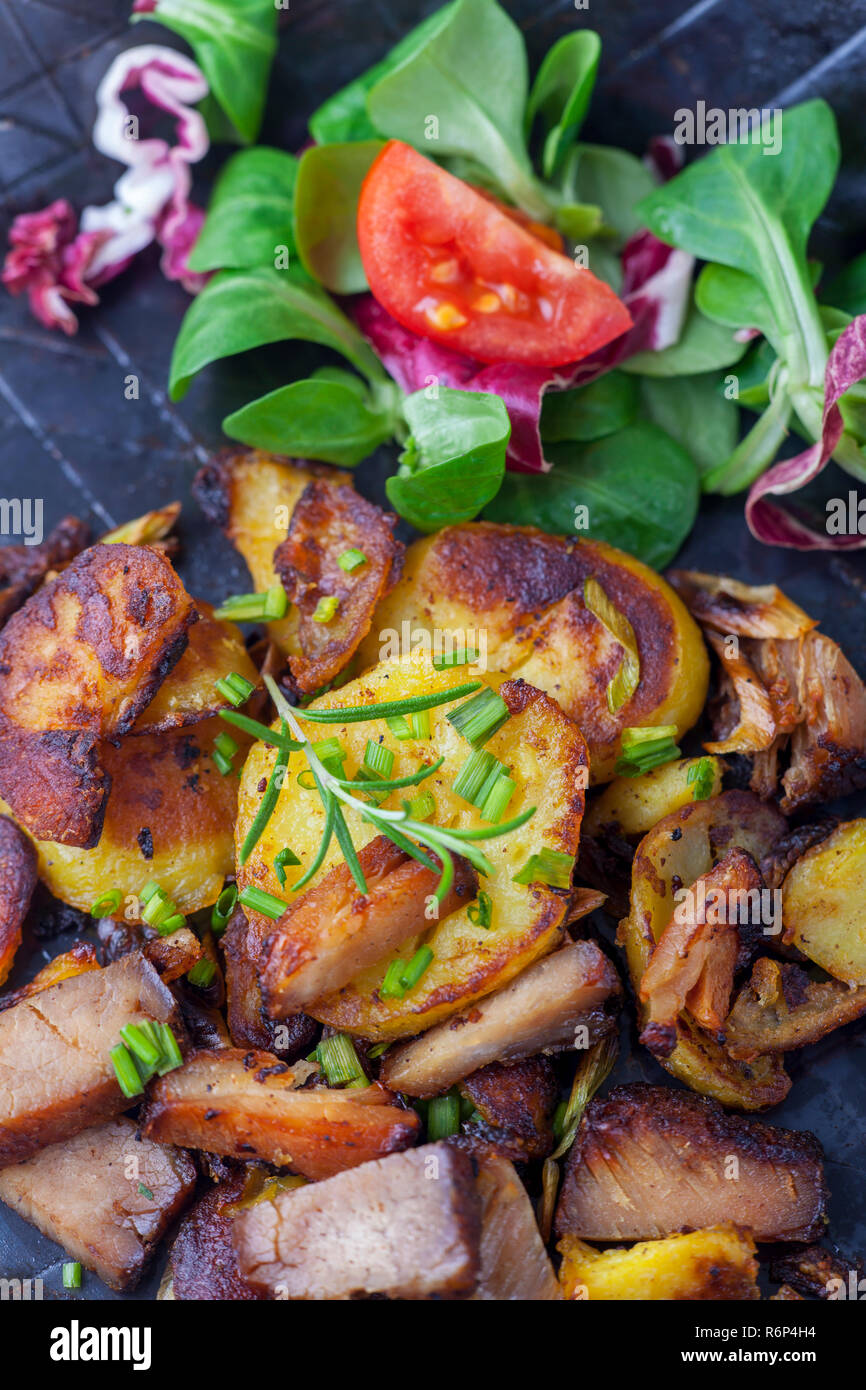 tyrolean potato salad in a pan Stock Photo - Alamy