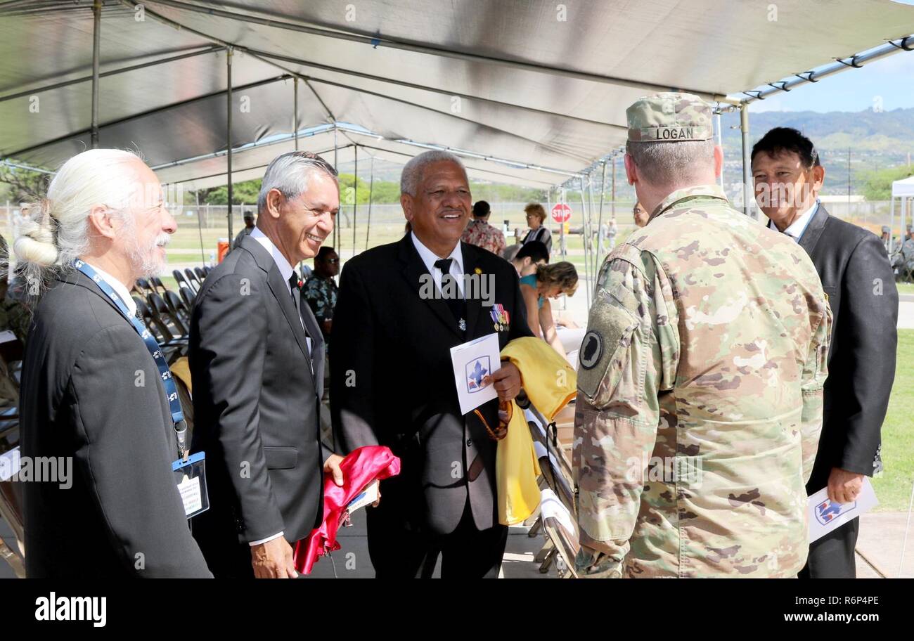 Maj. Gen. Arthur J. Logan greets distinguished guests before a ceremony ...