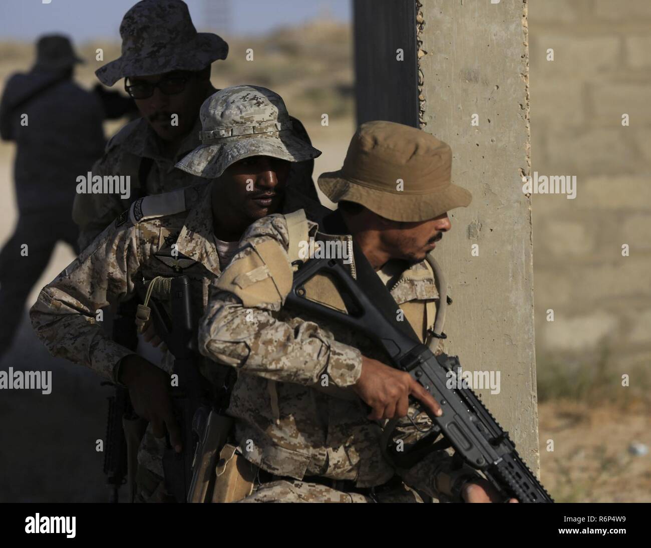 Saudi Arabian Naval Special Forces prepare for an assault during a ...