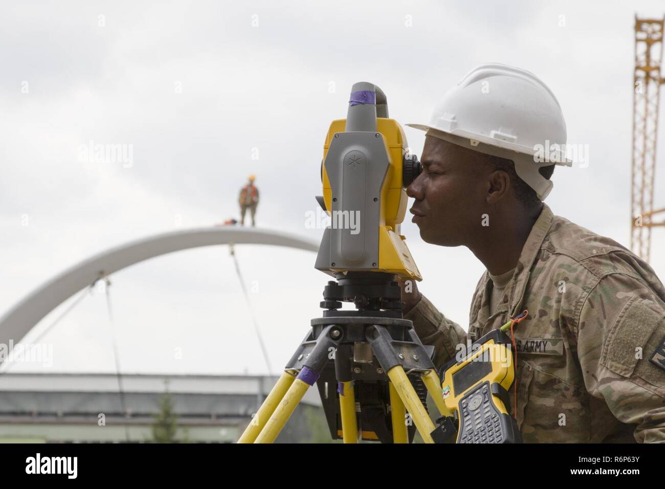 A surveryor Soldier from the 902nd Engineer Company, 15th Engineer ...