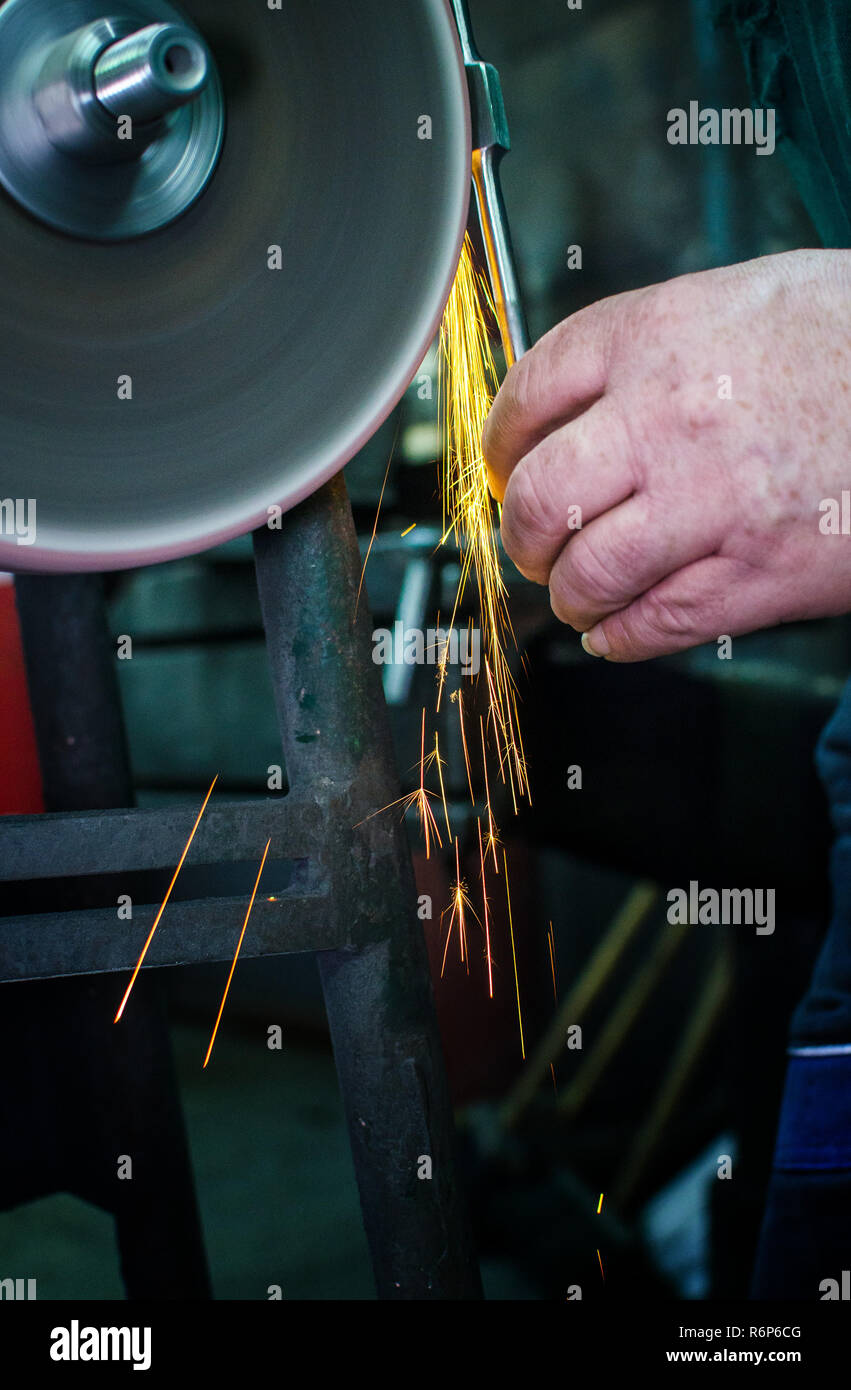 Industrial Grinder and Sparks Stock Photo - Alamy