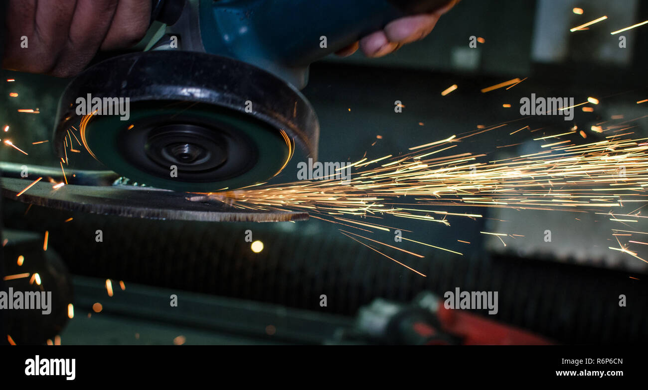 Industrial Grinder and Sparks Stock Photo - Alamy
