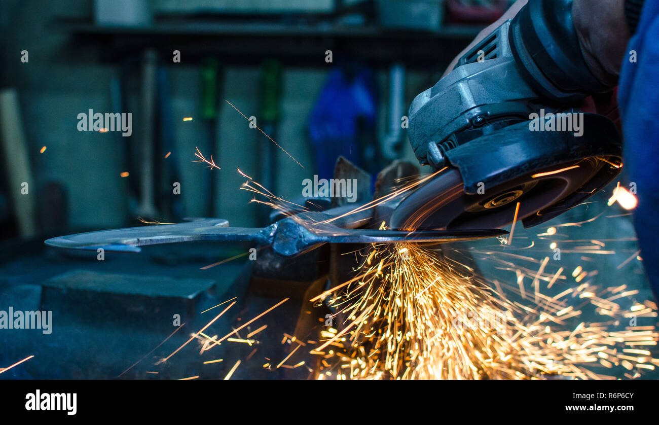 Industrial Grinder and Sparks Stock Photo - Alamy