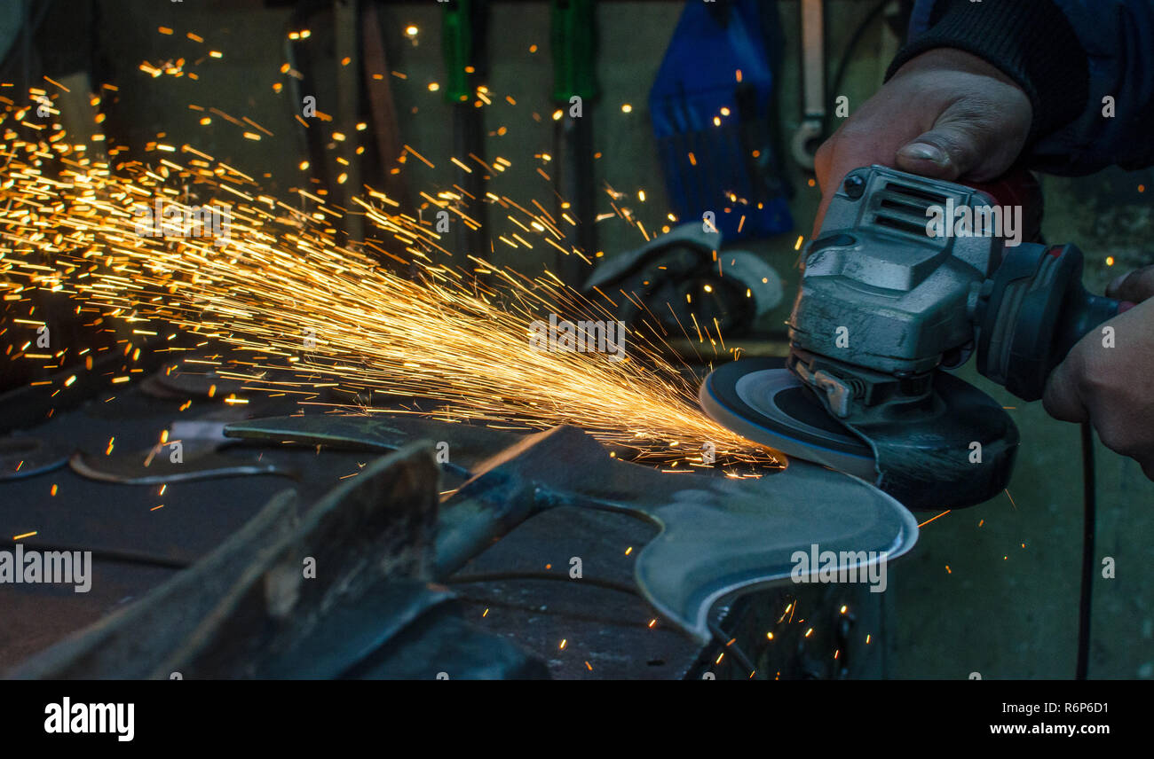 Industrial Grinder and Sparks Stock Photo - Alamy