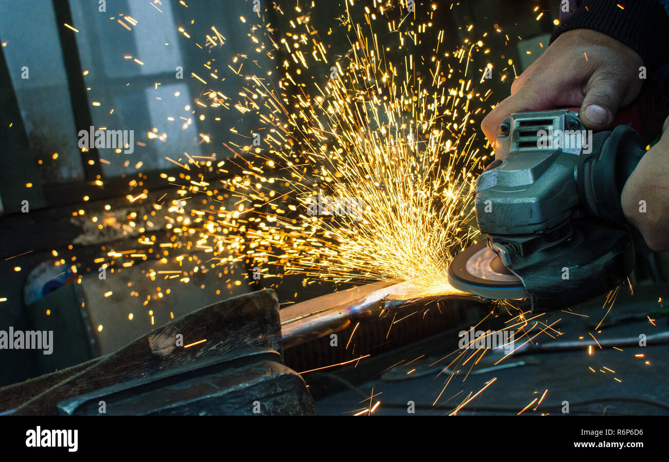 Industrial Grinder and Sparks Stock Photo - Alamy