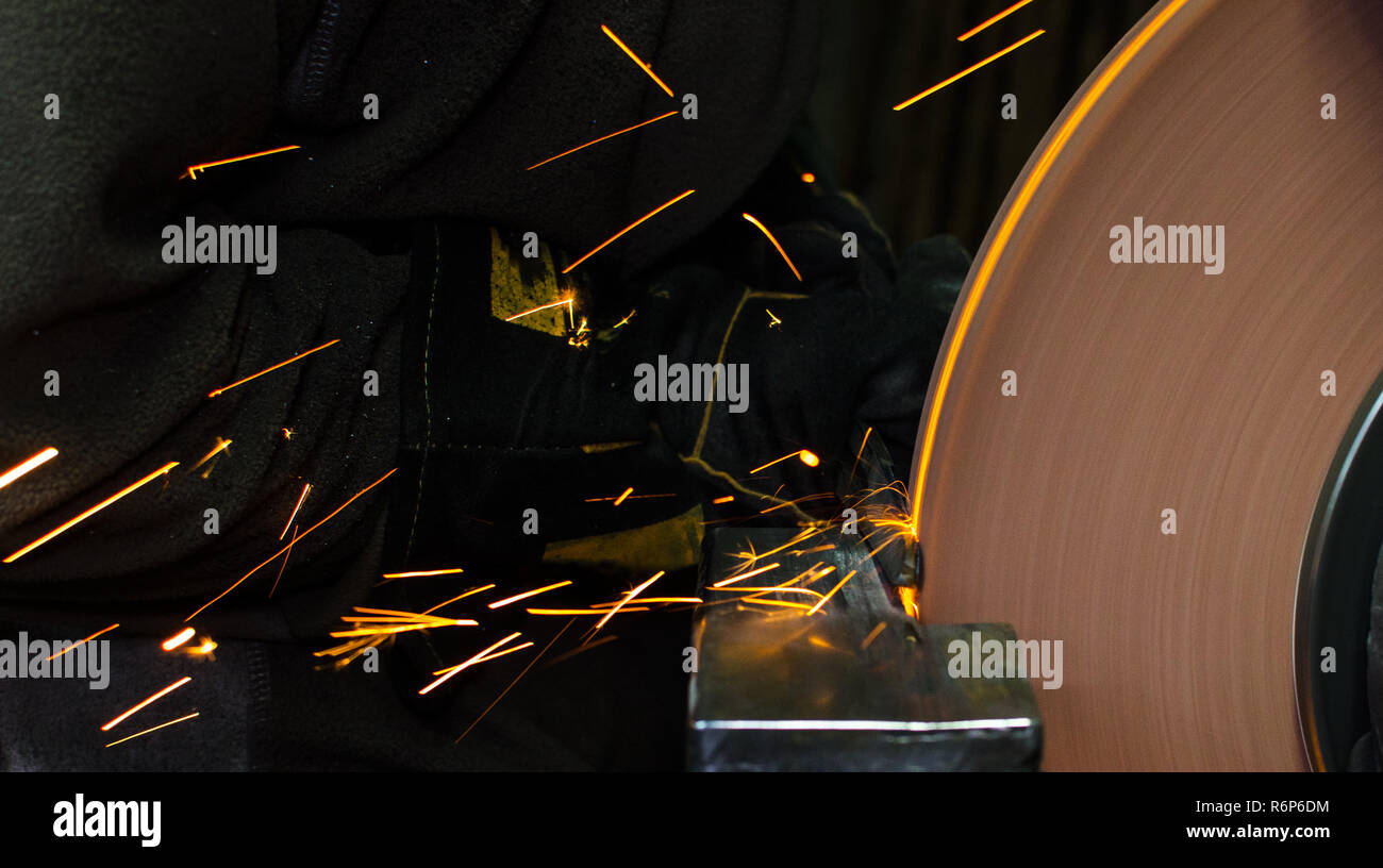 Industrial Grinder and Sparks Stock Photo - Alamy