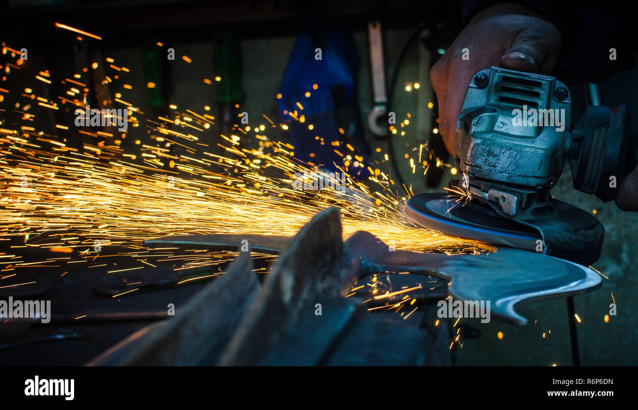 Industrial Grinder and Sparks Stock Photo - Alamy