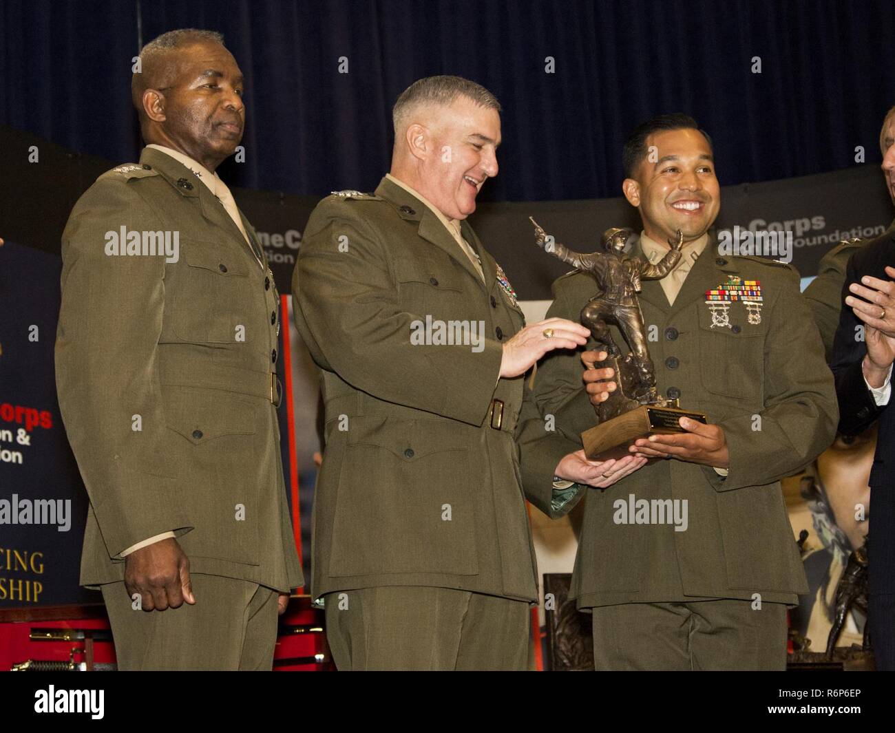 U.S. Marine Corps Gen. Glenn M. Walters, left, 34th assistant ...