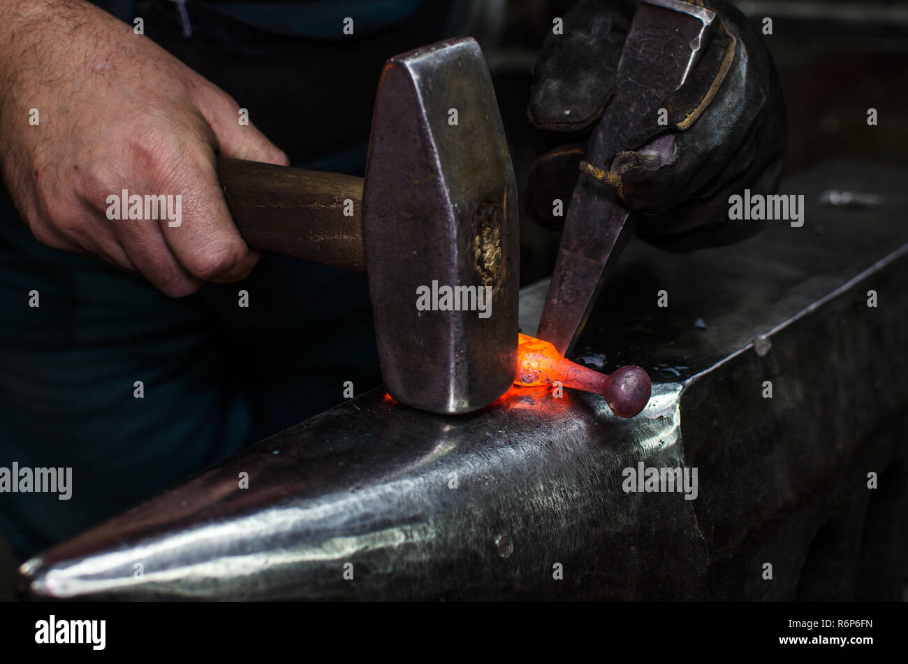 Blacksmith at work Stock Photo - Alamy