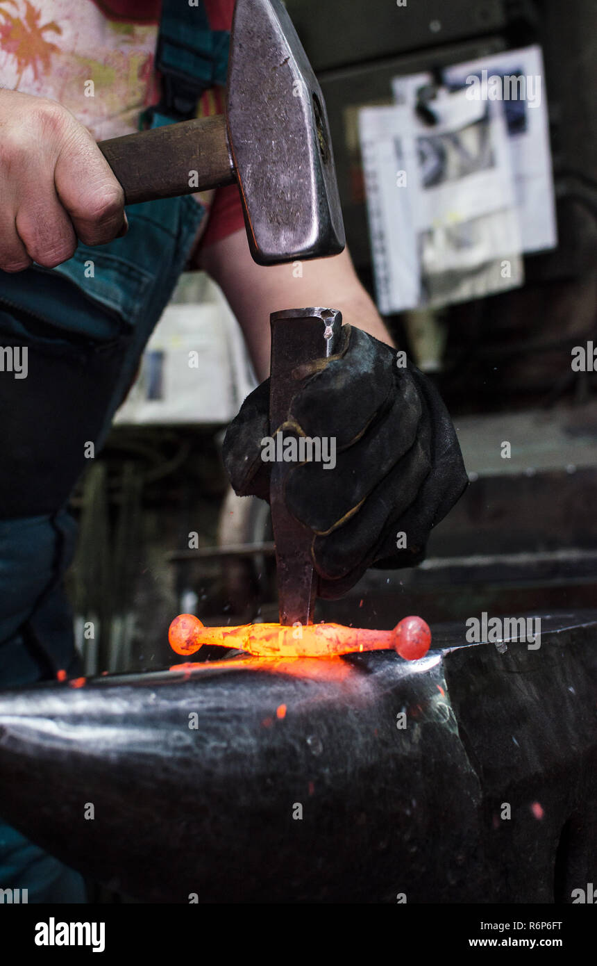 Blacksmith at work Stock Photo - Alamy