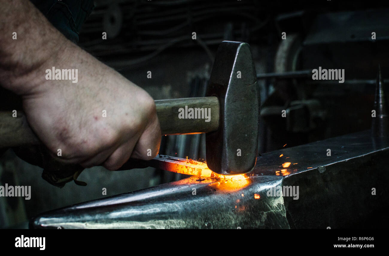 Blacksmith at work Stock Photo - Alamy