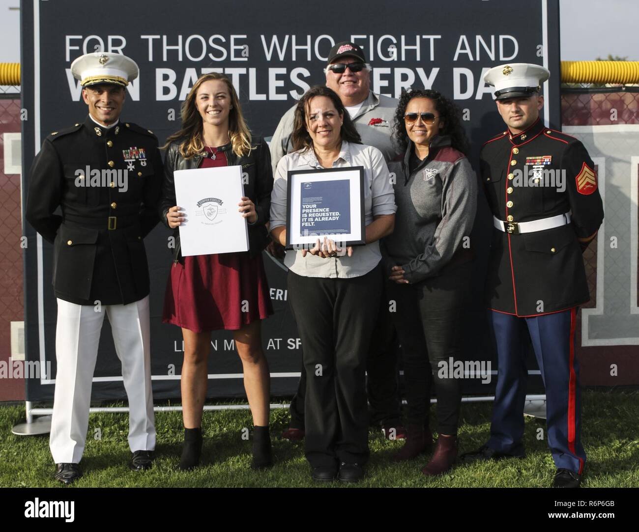 Maj. Jared Reddinger (Left) and Sgt. Troy Harris (Right) present ...