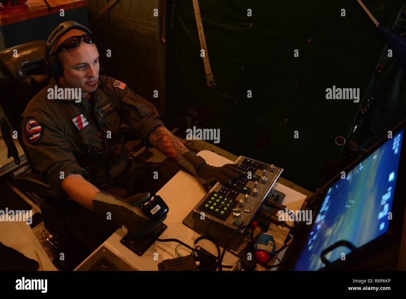 Petty Officer 2nd Class Chris Parmenter, an aviation maintenance ...