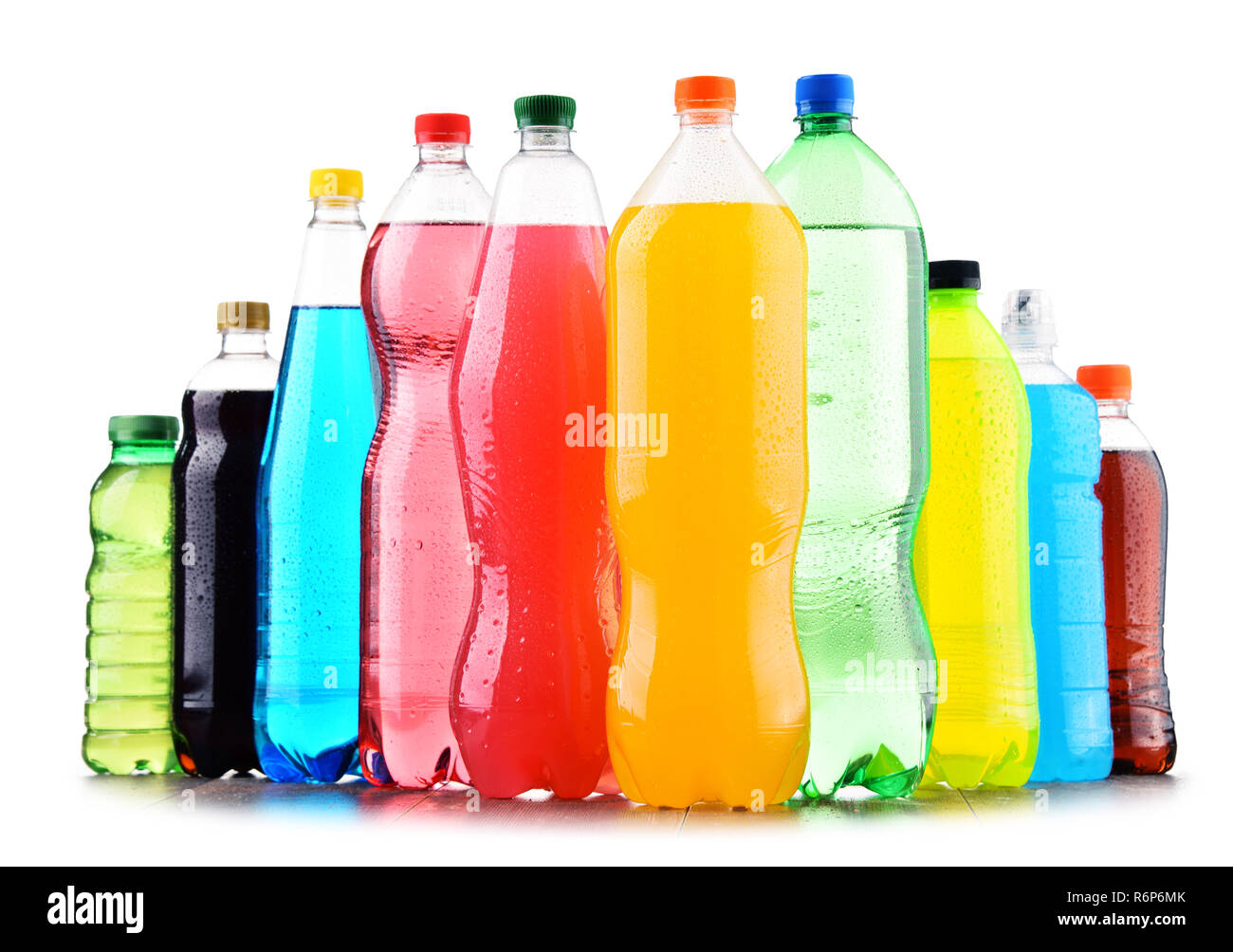 Plastic bottles of assorted carbonated soft drinks over white Stock ...
