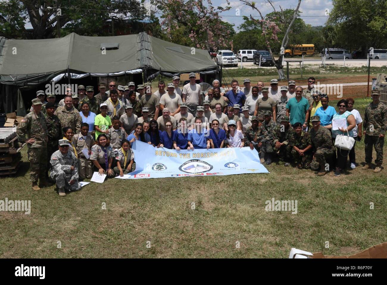 U.S., Columbian and Belizean military personnel, as well as local and ...