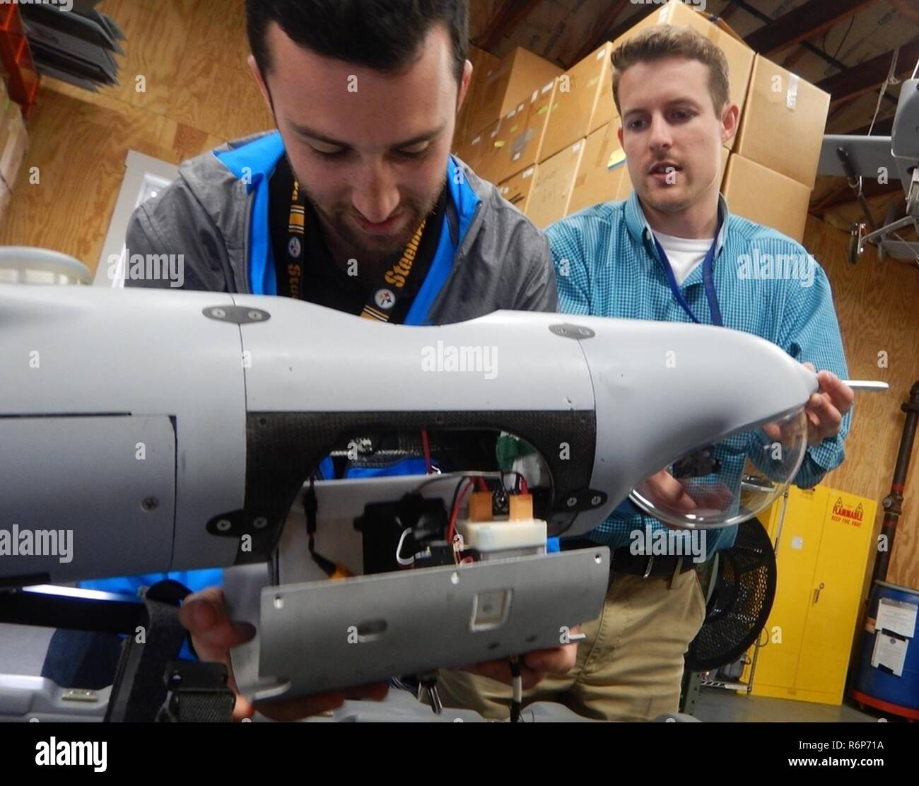 DAHLGREN, Va. (June 15, 2017) - Navy scientist Jordan Lieberman, left ...