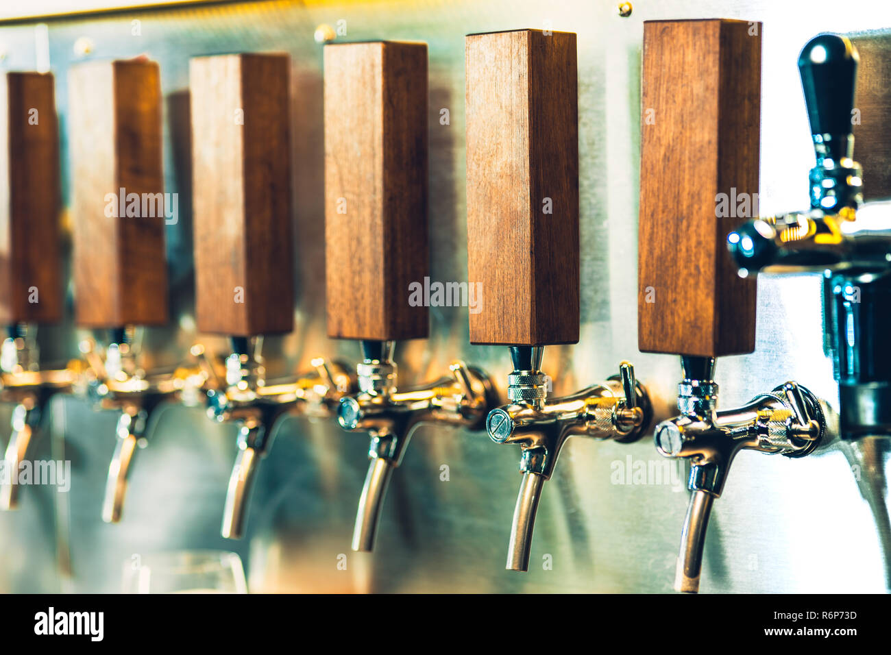 Beer craft. Bar table. Steel taps. Shiny taps. Glassses with beer Stock ...