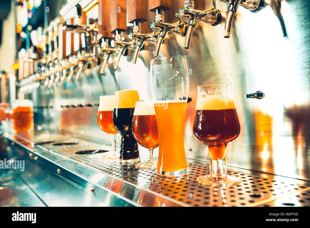 Beer craft. Bar table. Steel taps. Shiny taps. Glassses with beer Stock ...