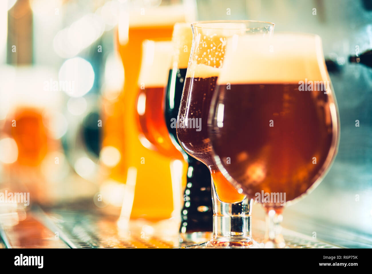 Beer craft. Bar table. Steel taps. Shiny taps. Glassses with beer Stock ...