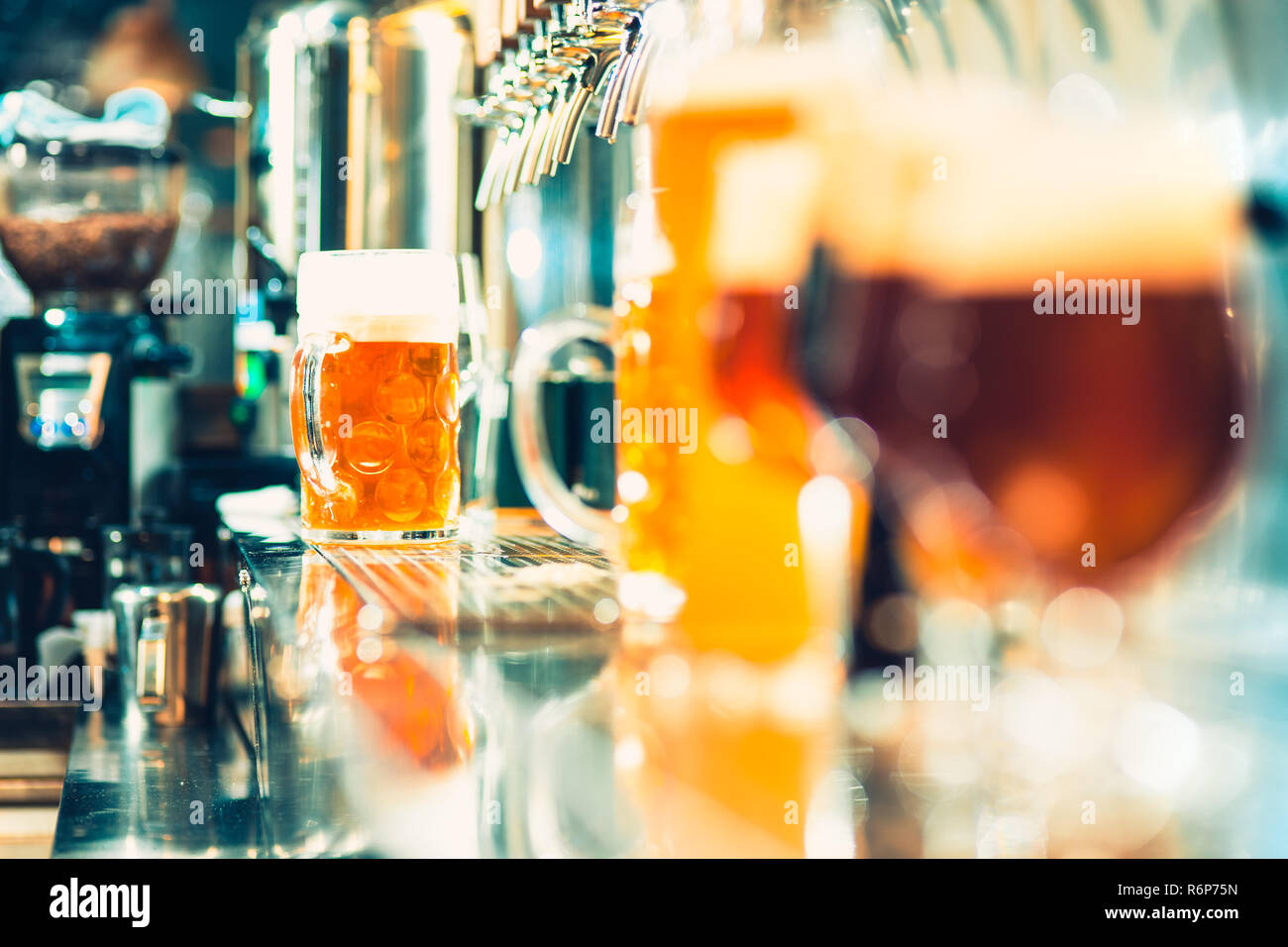 Beer craft. Bar table. Steel taps. Shiny taps. Glassses with beer Stock ...