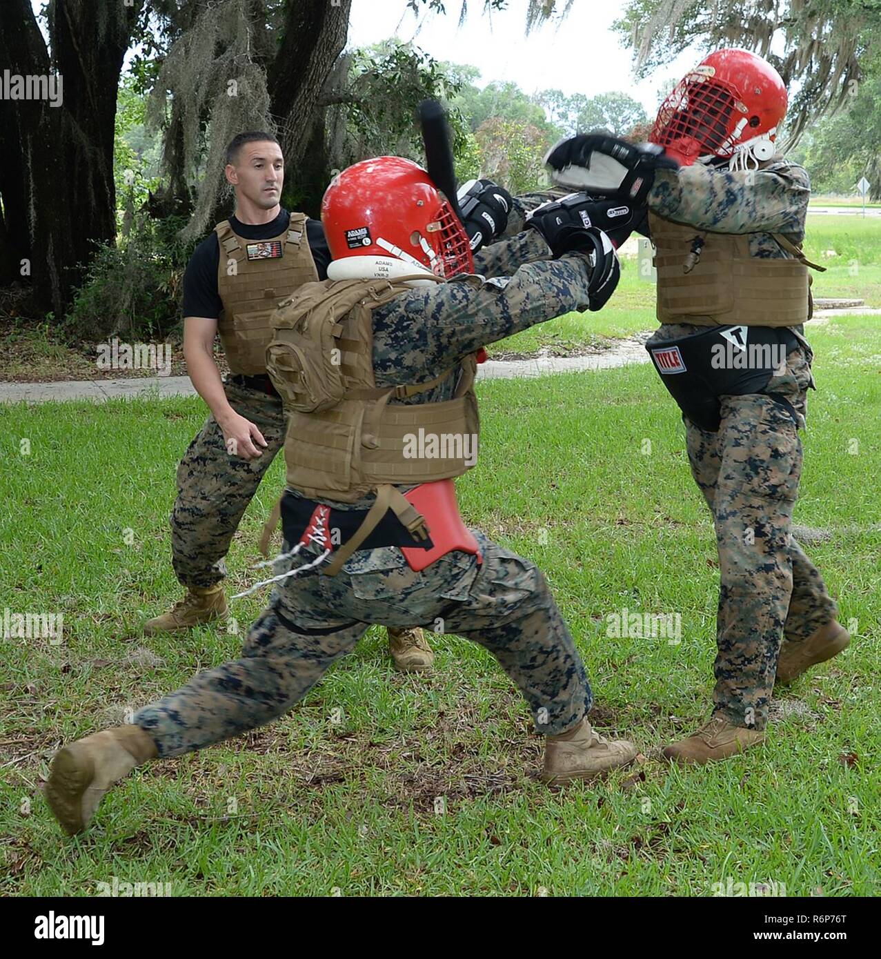 Martial arts instructor students Sgt. Marquis Jones, right, and Cpl ...