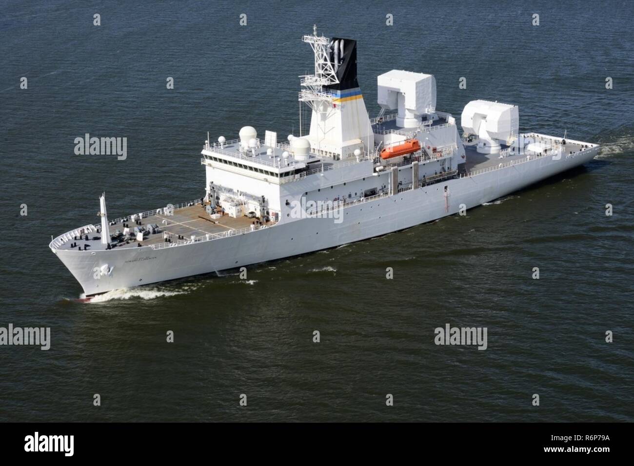 The USNS Howard O. Lorenzen (T-AGM-25) passes Astoria, Ore., as it ...