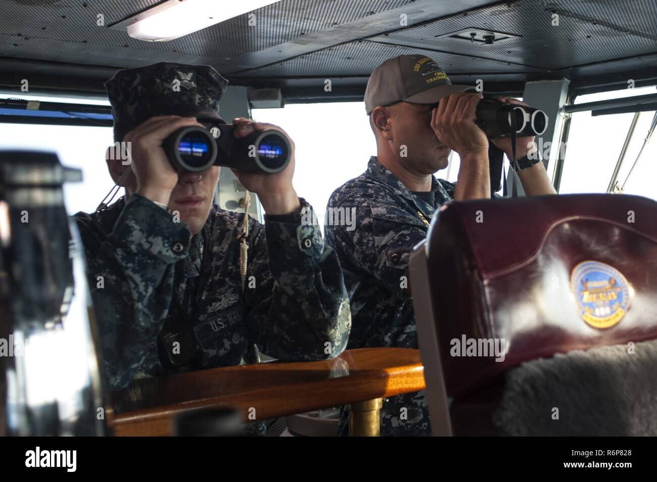 PORTSMOUTH, Va. (July 21, 2017) Lt. Cmdr. Waylon Sommer, right, and ...
