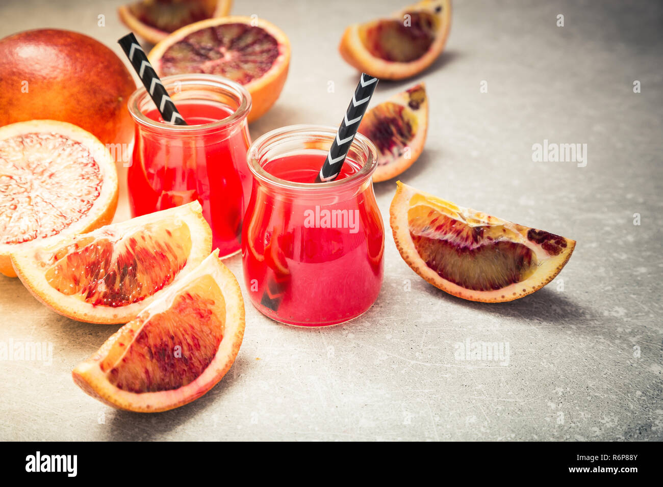 blood orange juice. red orange juice with orange slice Stock Photo - Alamy