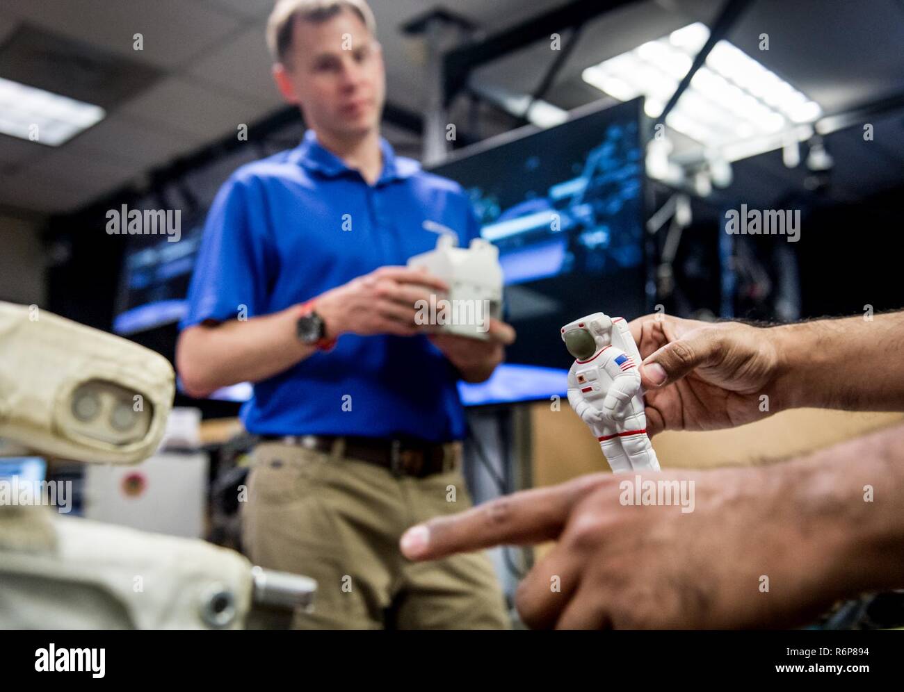 NASA Extravehicular Activity (EVA) trainer, Steve Vilano briefs ...