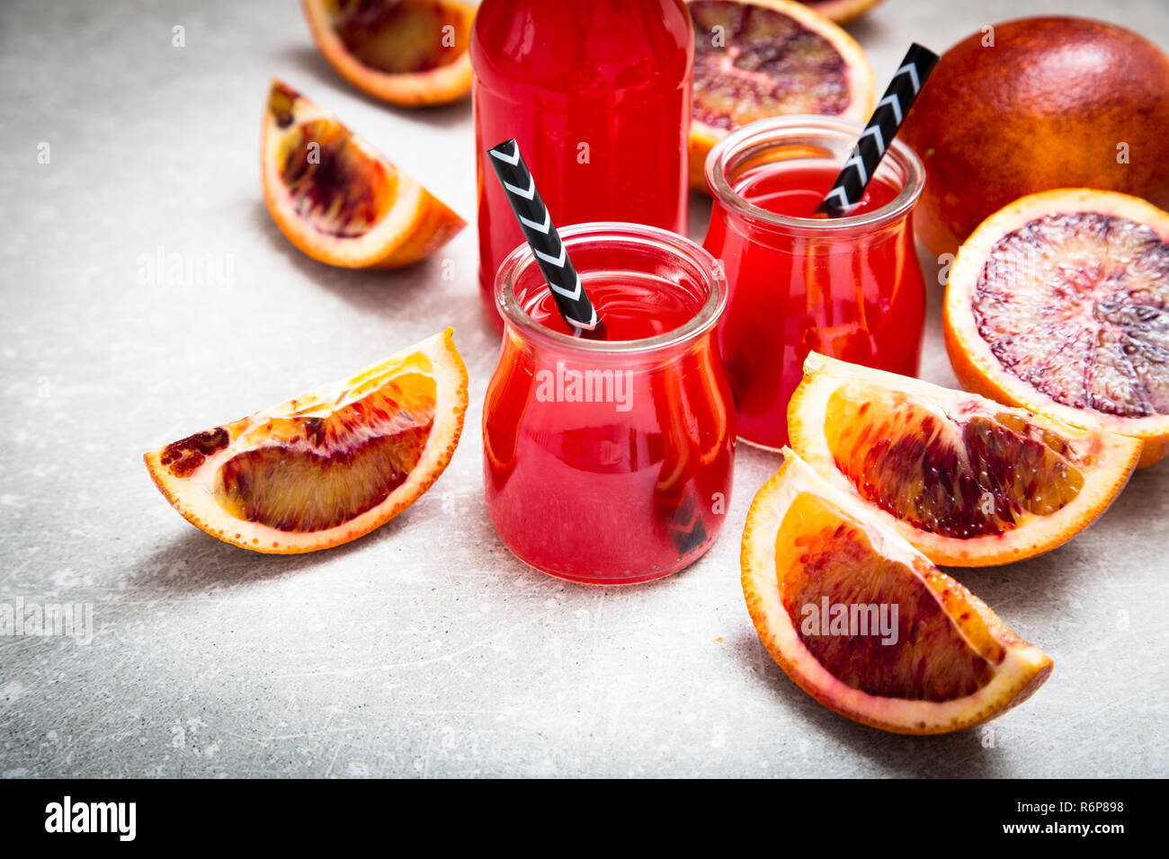 blood orange juice. red orange juice with orange slice Stock Photo - Alamy