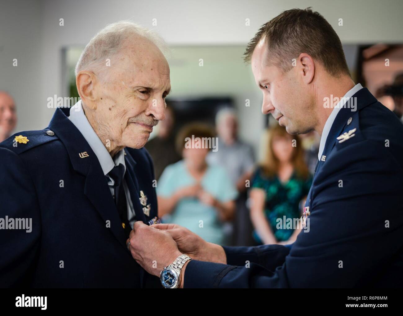 Retired Maj. Joe Campbell is awarded the Distinguished Flying Cross by ...