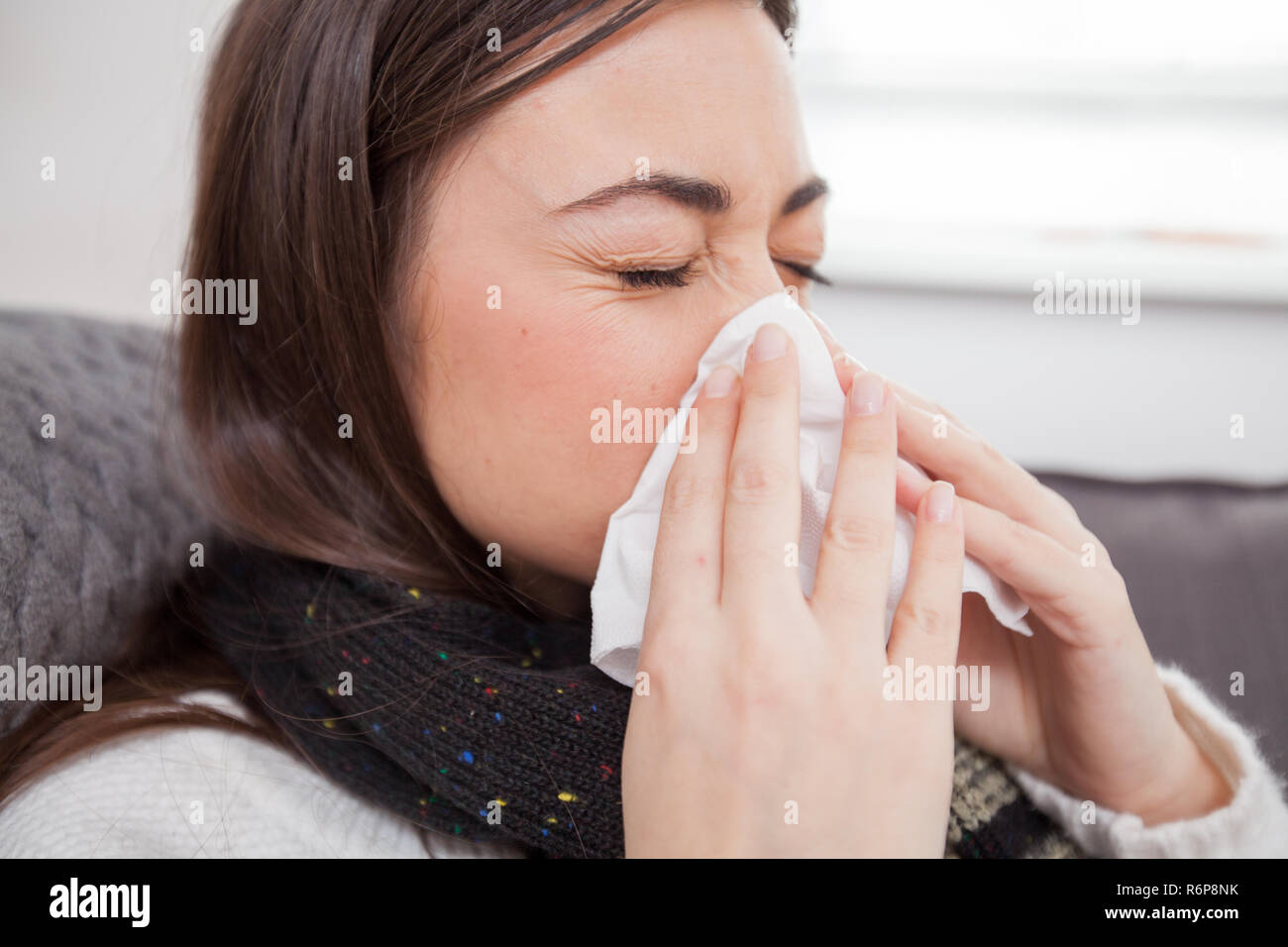 Sick young woman lies hi-res stock photography and images - Alamy
