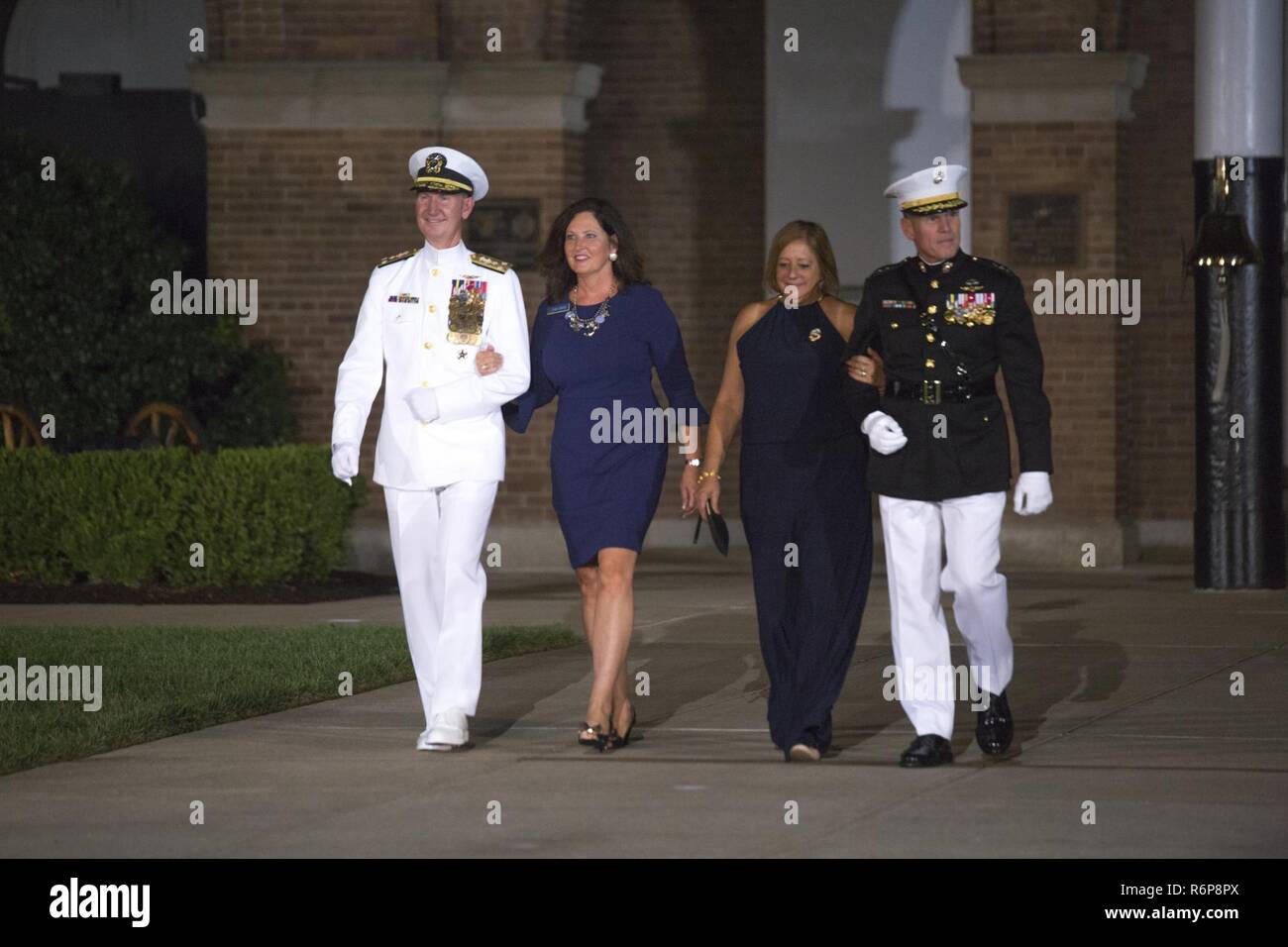 U.S. Navy Vice Adm. Walter E. Carter Jr., far left, superintendent, U.S ...