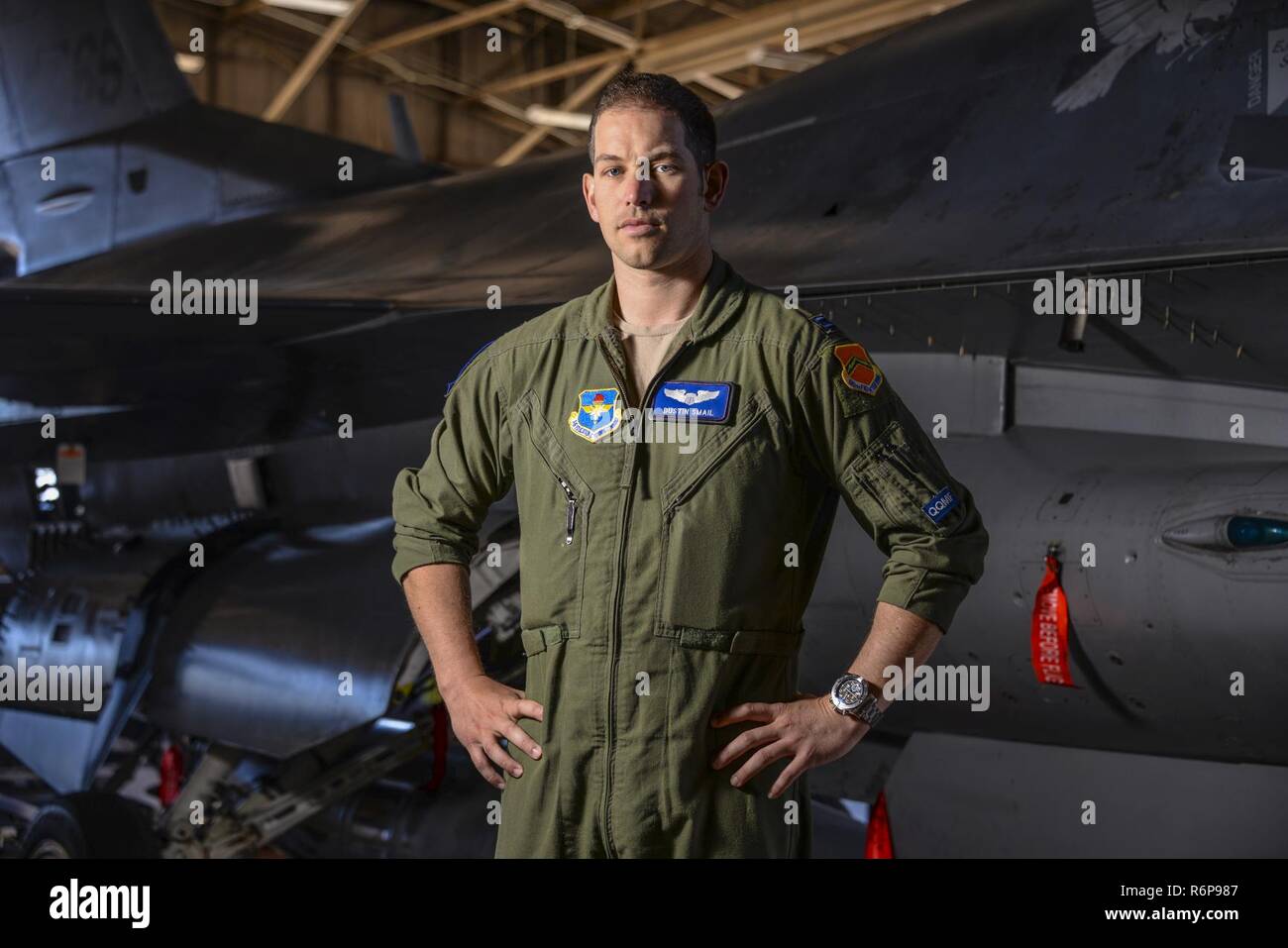Capt. Dustin Smail, 309th Fighter Squadron instructor pilot, poses for ...