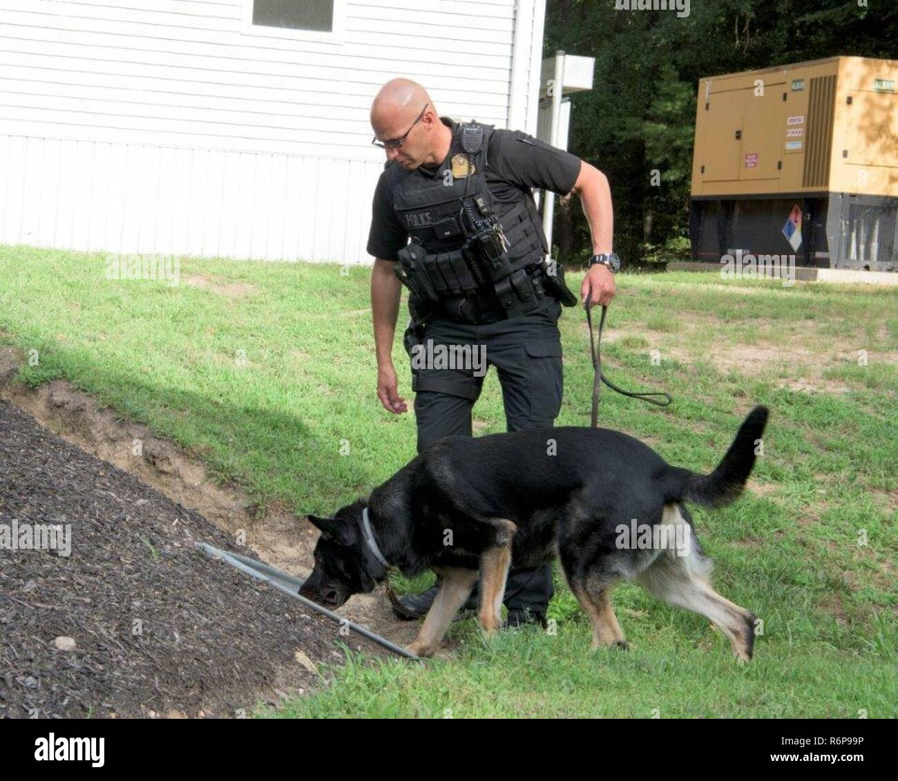 United States Secret Service photo of canine and handler during ...