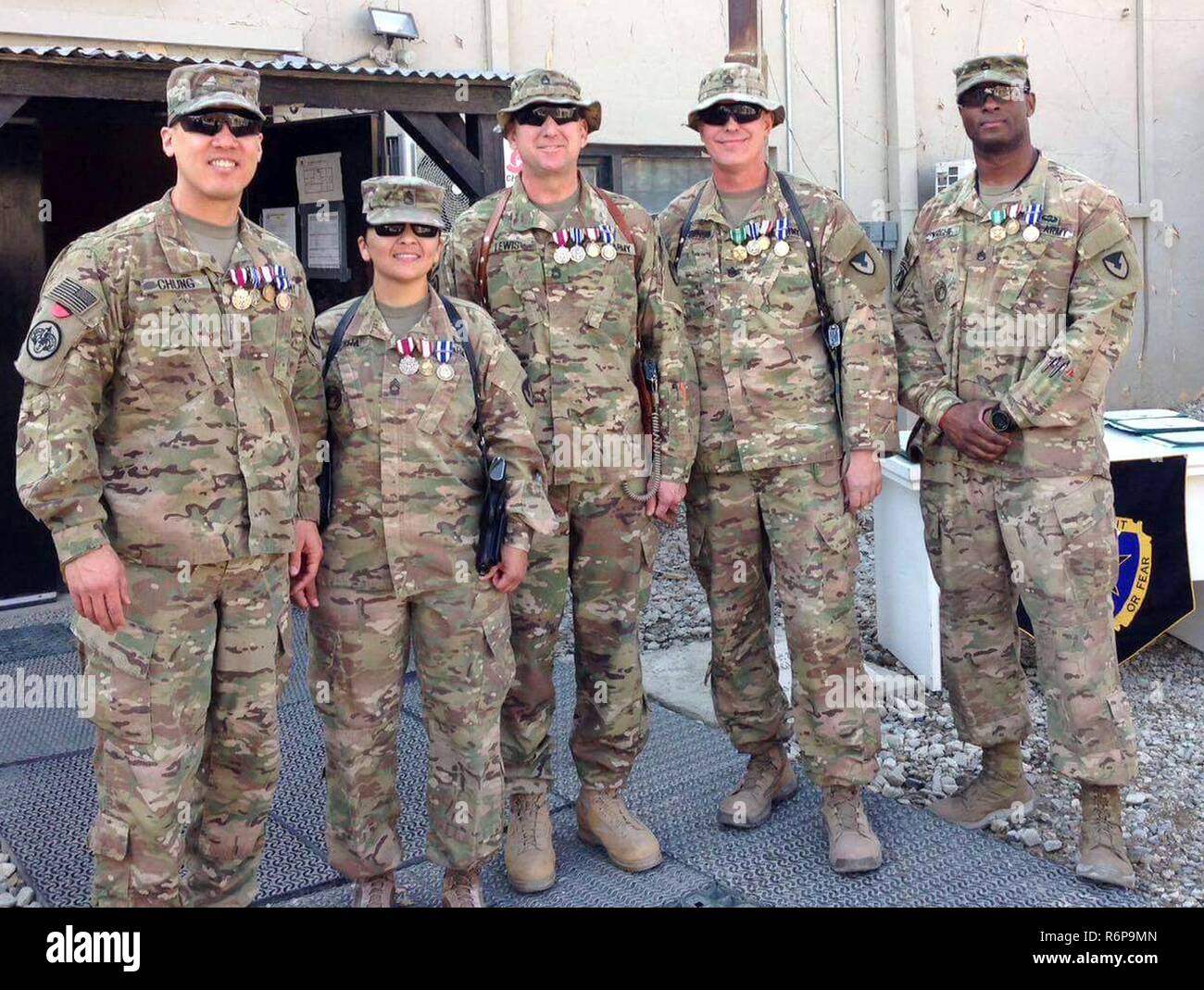 Members of the 607th Contracting Team stand in front of the Regional ...