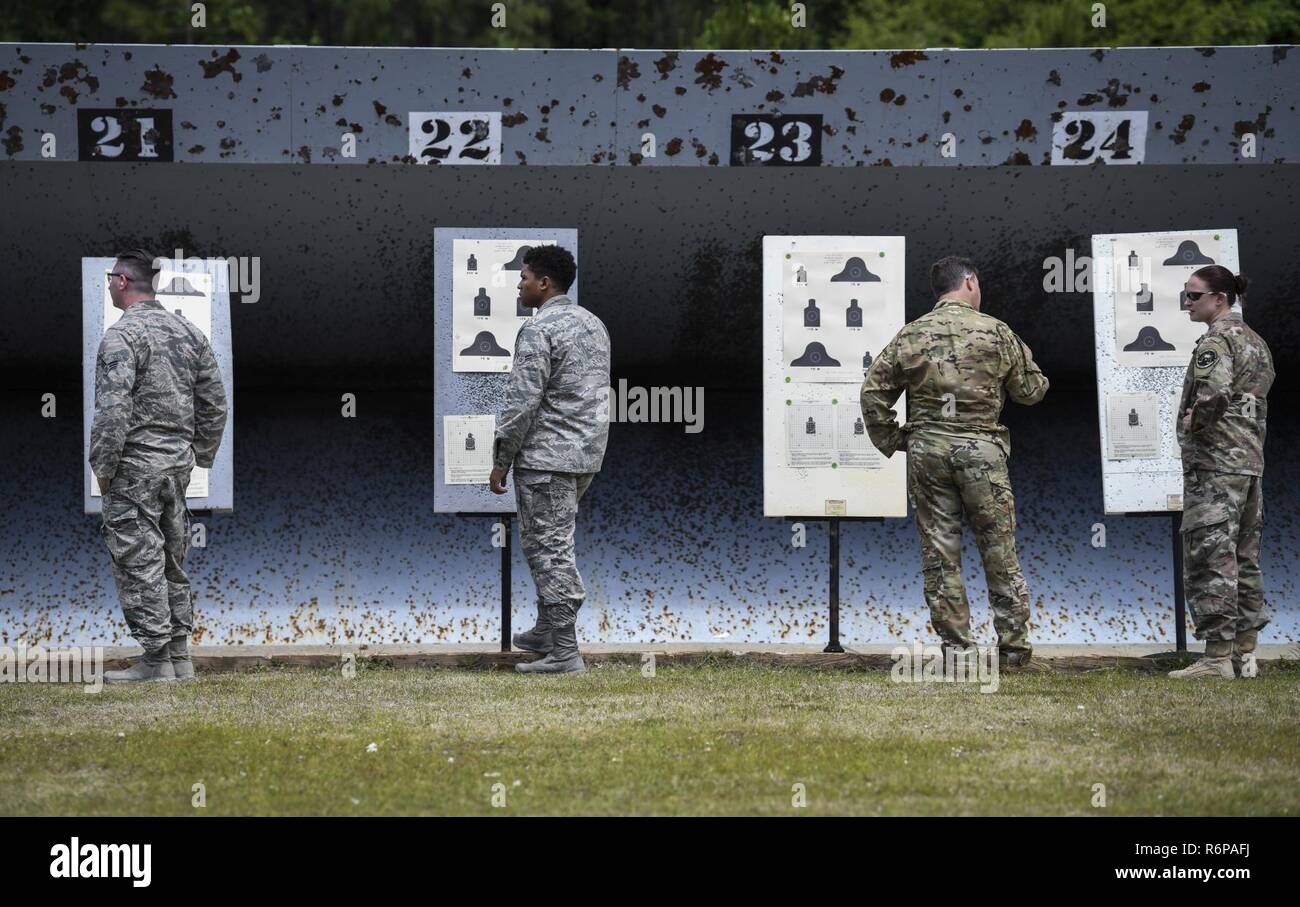 Air Commandos inspect their targets during M4 Carbine rifle training at ...
