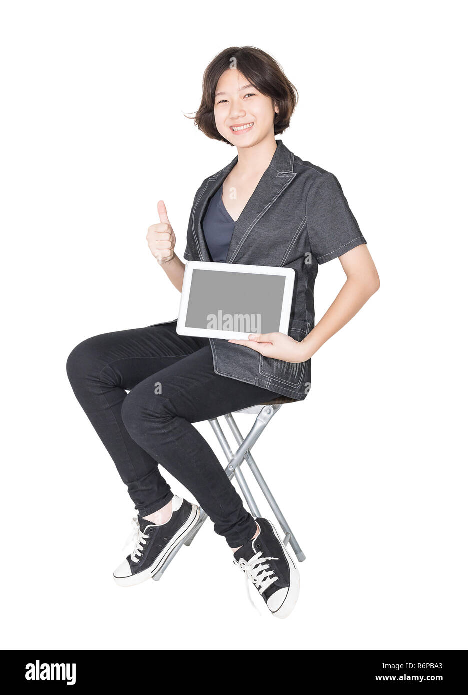 Women sit on chair with using mobile phone Stock Photo - Alamy