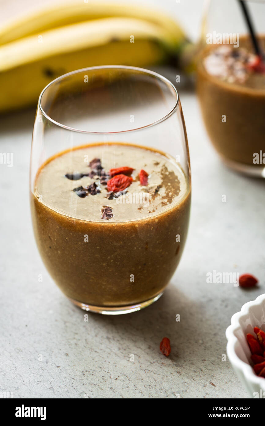 Banana,Flax meal and Goji Coffee Smoothie Stock Photo - Alamy