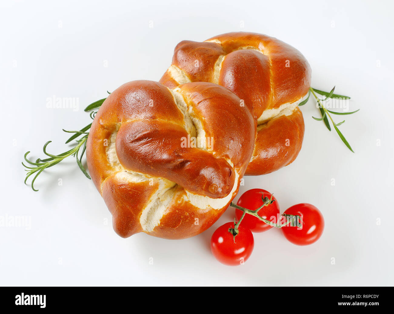 Knot shaped dinner rolls Stock Photo - Alamy