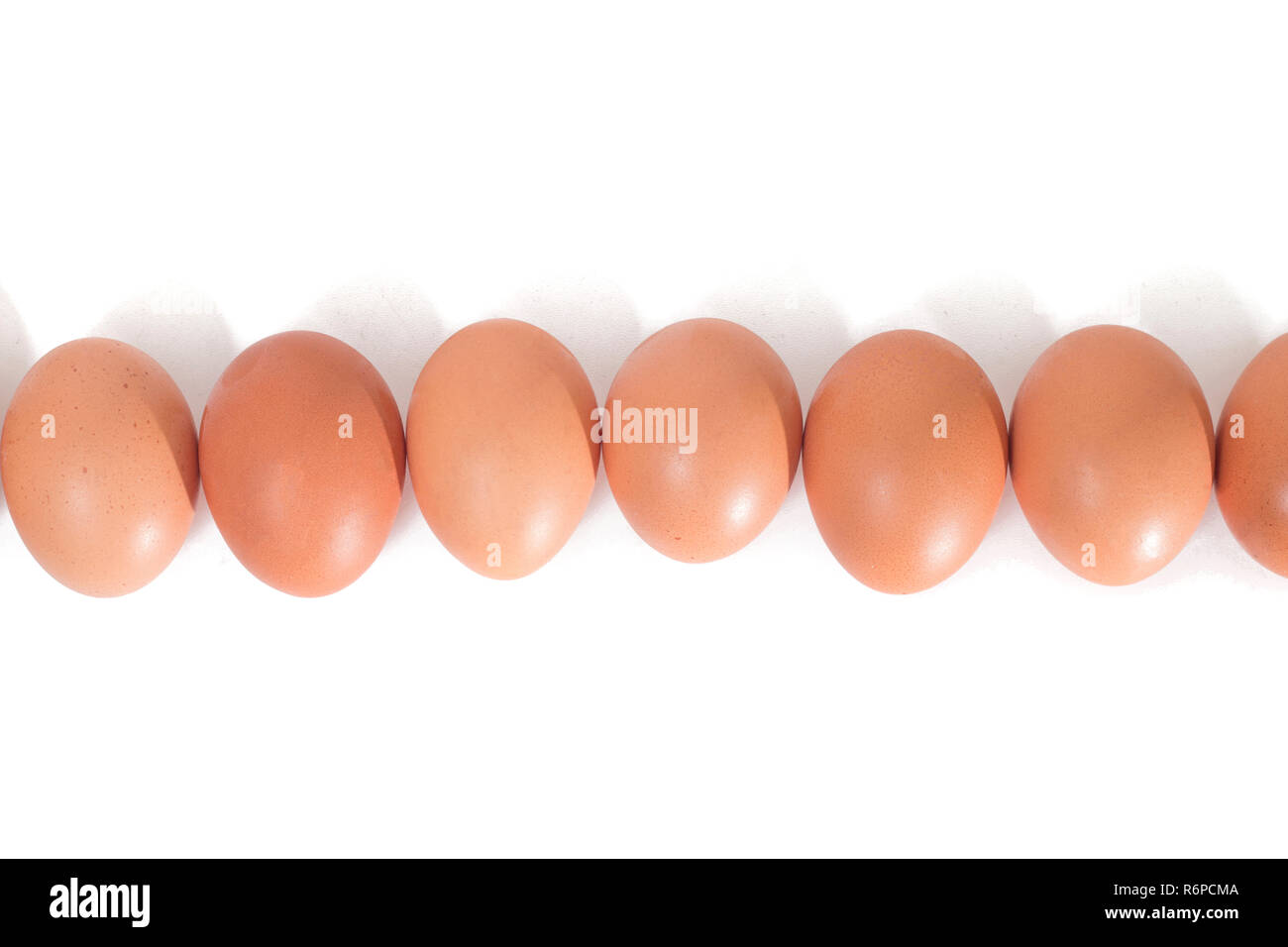 eggs aligned horizontally Stock Photo - Alamy