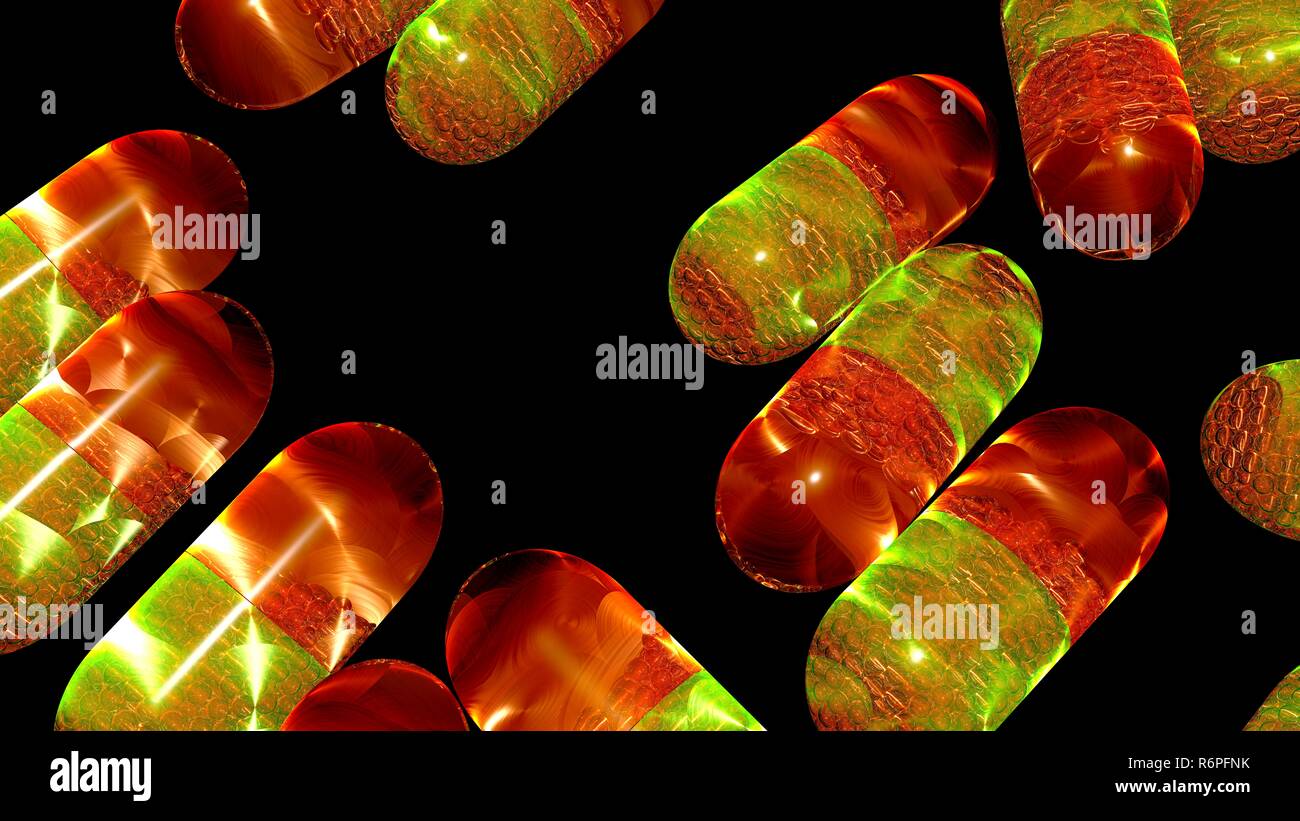 Close up view of shining capsule pills with small medicinal granules ...